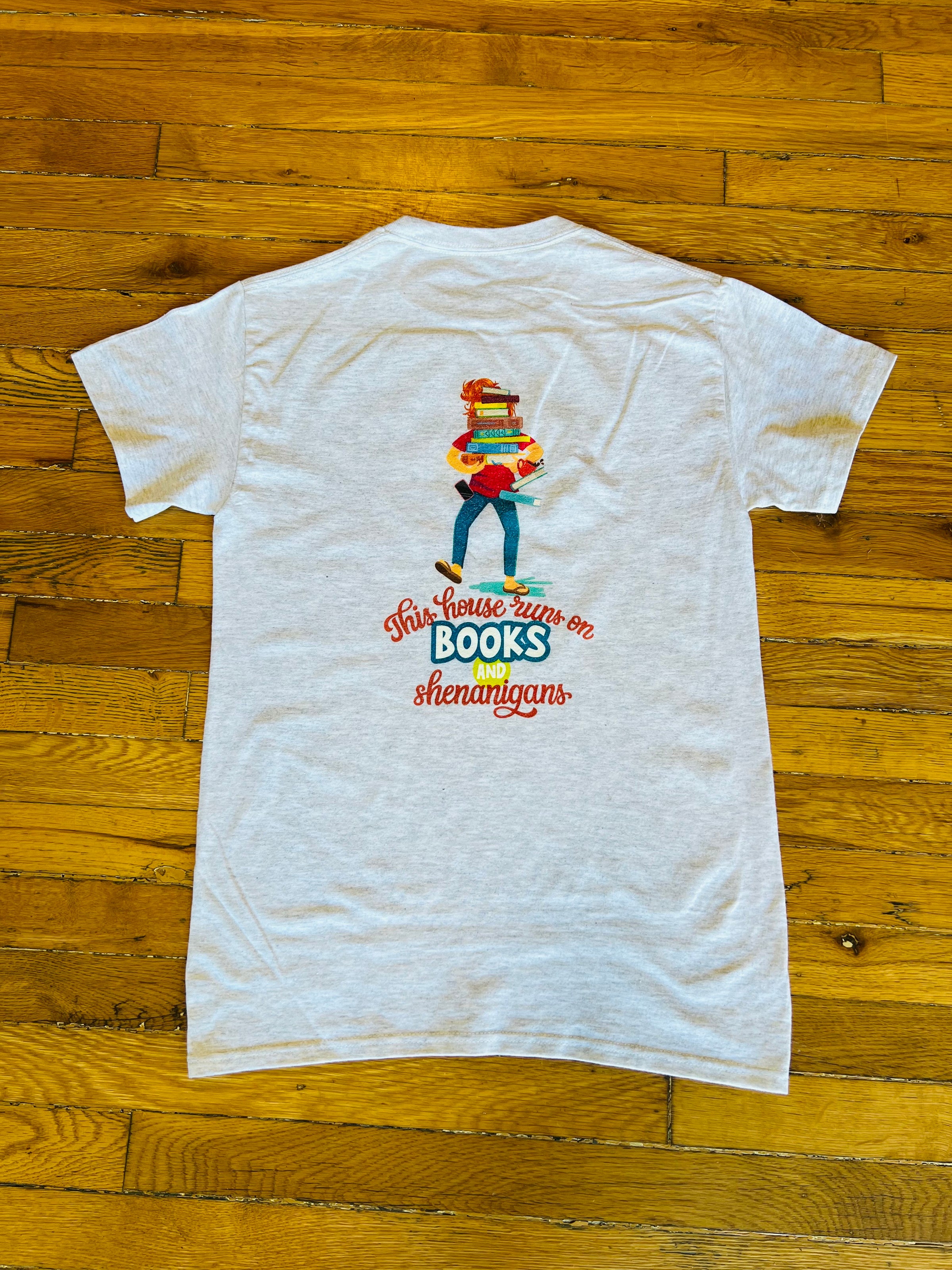 THIS HOUSE RUNS ON BOOKS AND SHENANIGANS - 2025 TTP T-SHIRT | TURN THE PAGE BOOKSTORE